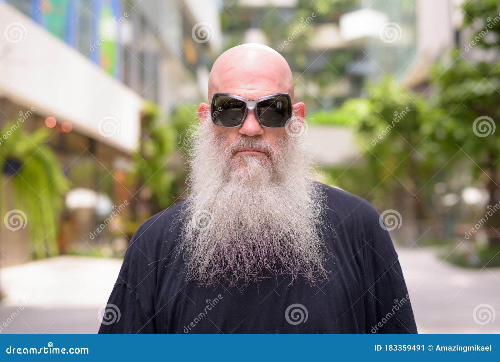 Face of Mature Handsome Bald Bearded Man Wearing Sunglasses with Nature ... Face of Mature Handsome Bald Bearded Man Wearing Sunglasses with Nature ...