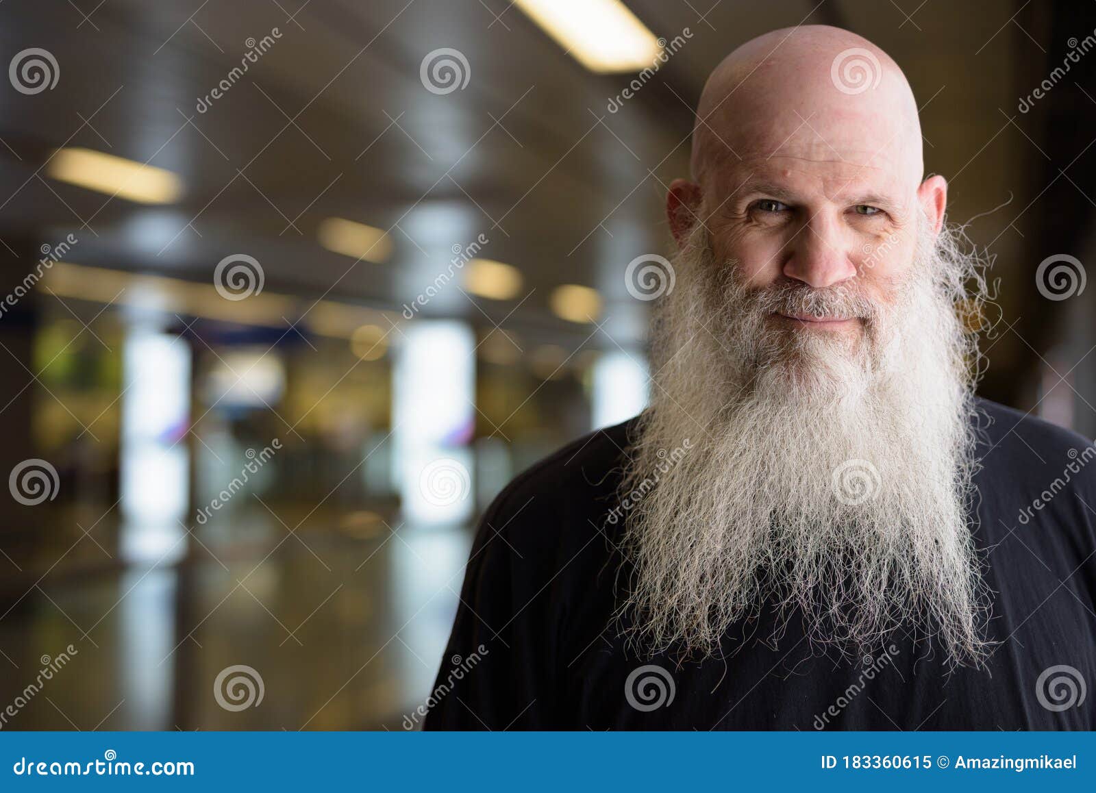 Face of Mature Handsome Bald Bearded Man at the Subway Train Station ... Face of Mature Handsome Bald Bearded Man at the Subway Train Station ...