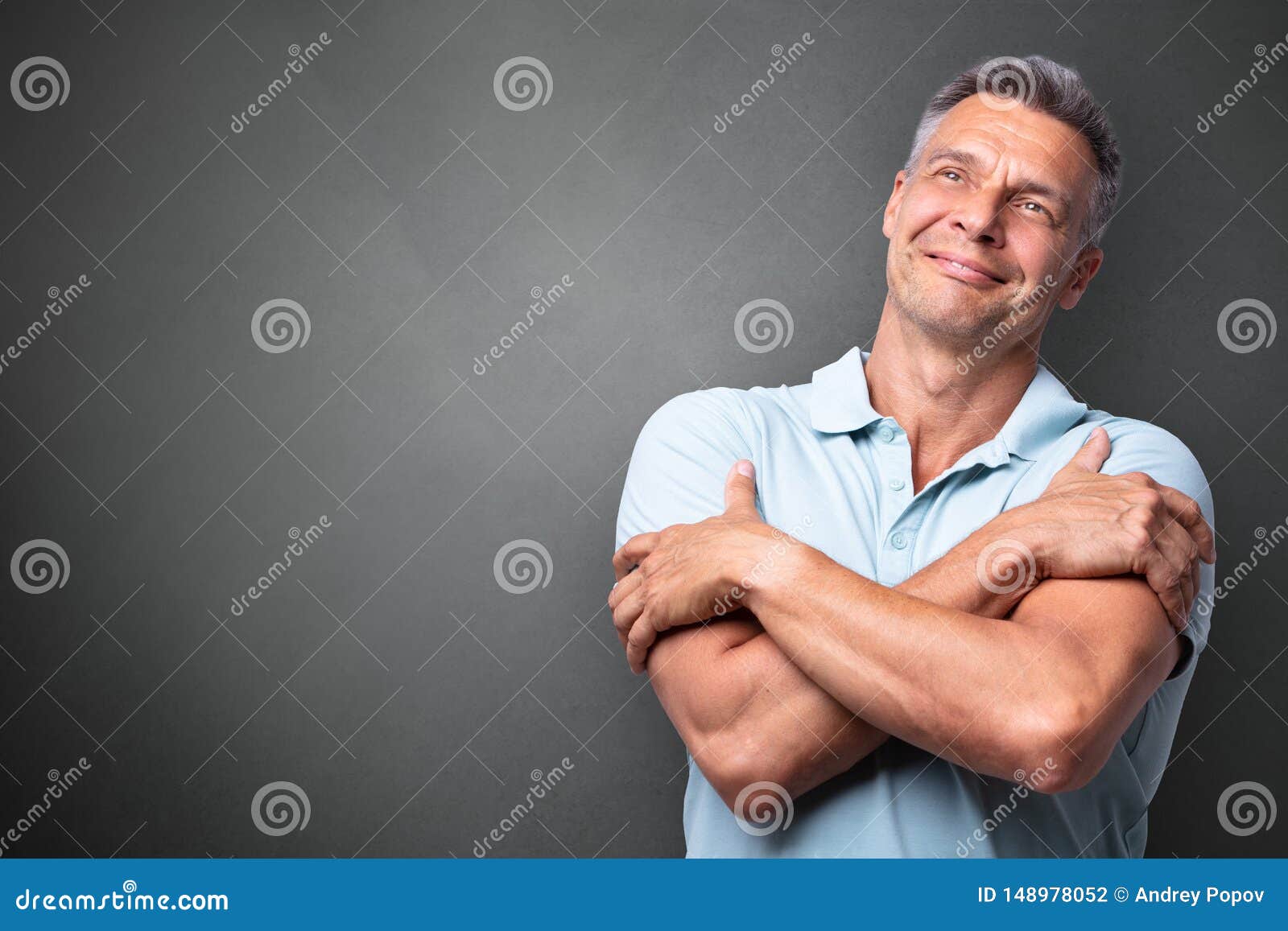Portrait of a Mature Man Hugging Himself Stock Photo - Image of ...