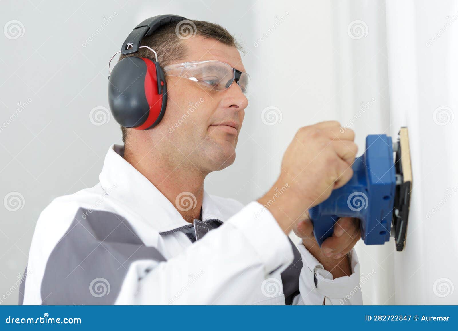 Portrait Mature Man Sanding Wall Stock Image - Image of plasterer ...