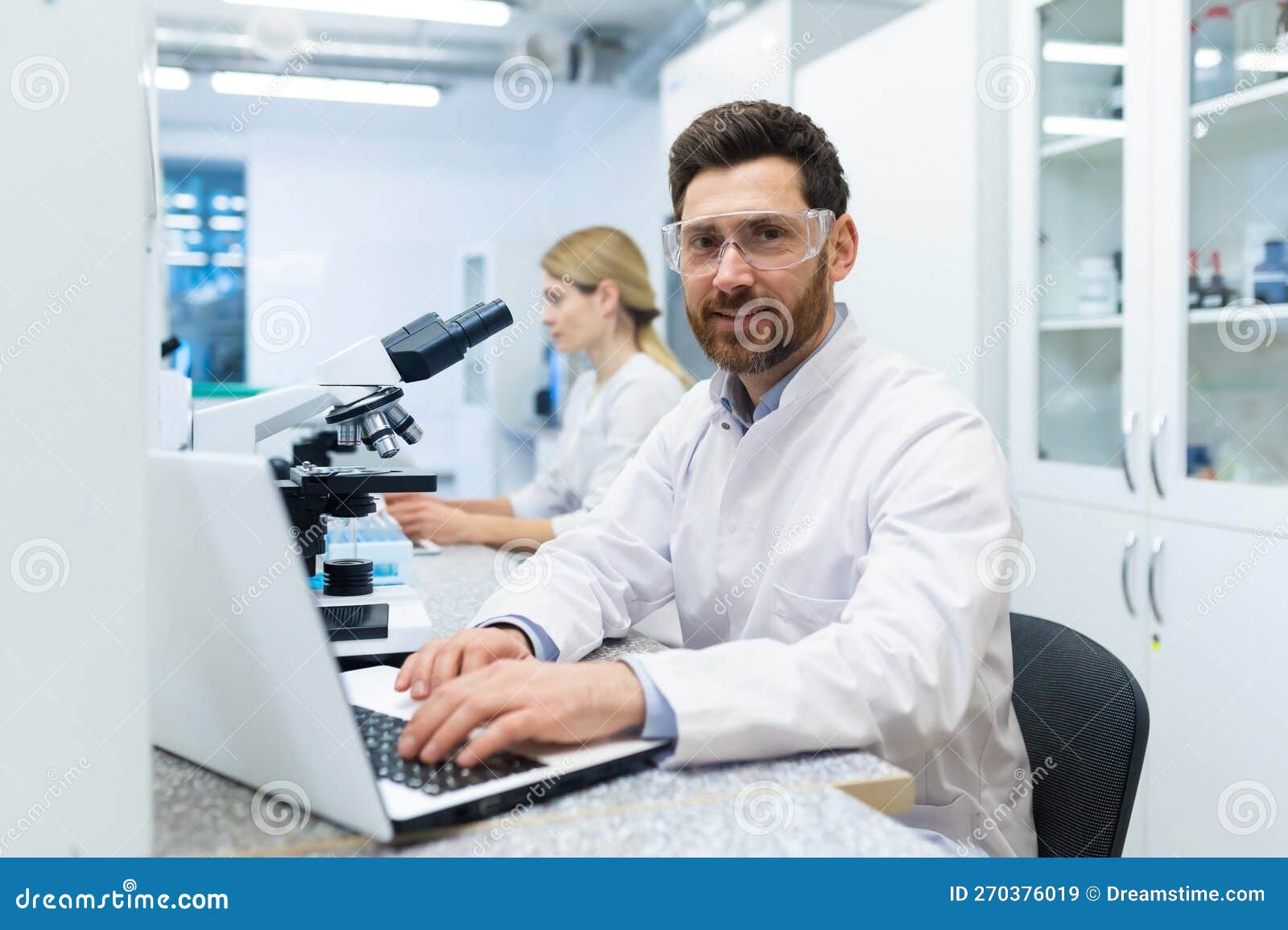 Portrait of Mature Successful Scientist Lab Technician at Workplace in ...