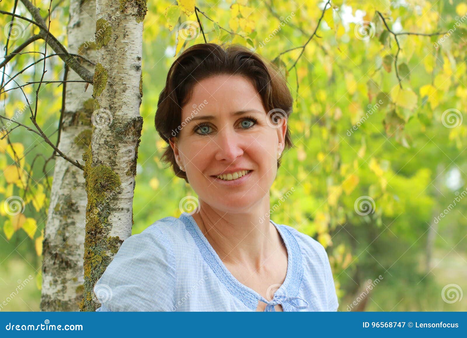Portrait of a Mature Woman Under a Birch Tree Stock Image - Image of ...