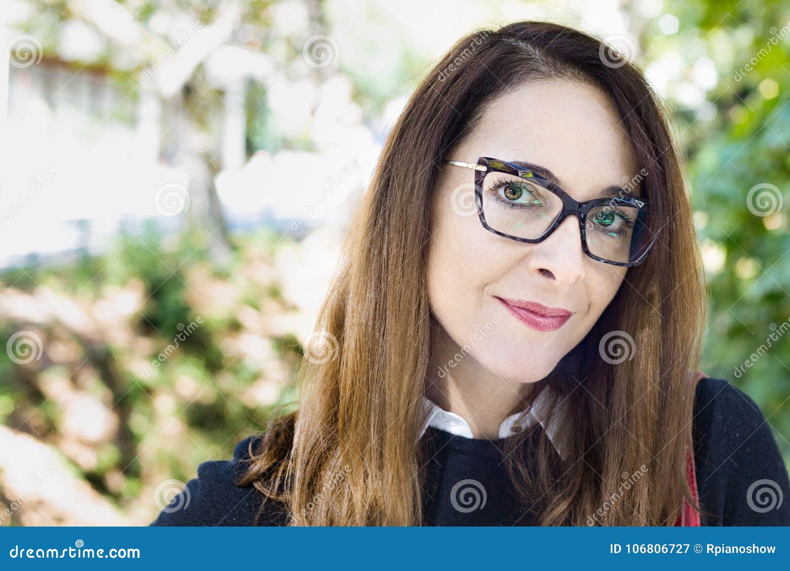 Portrait Of A Mature Woman Wearing Eyeglasses Outdoors Stock Image