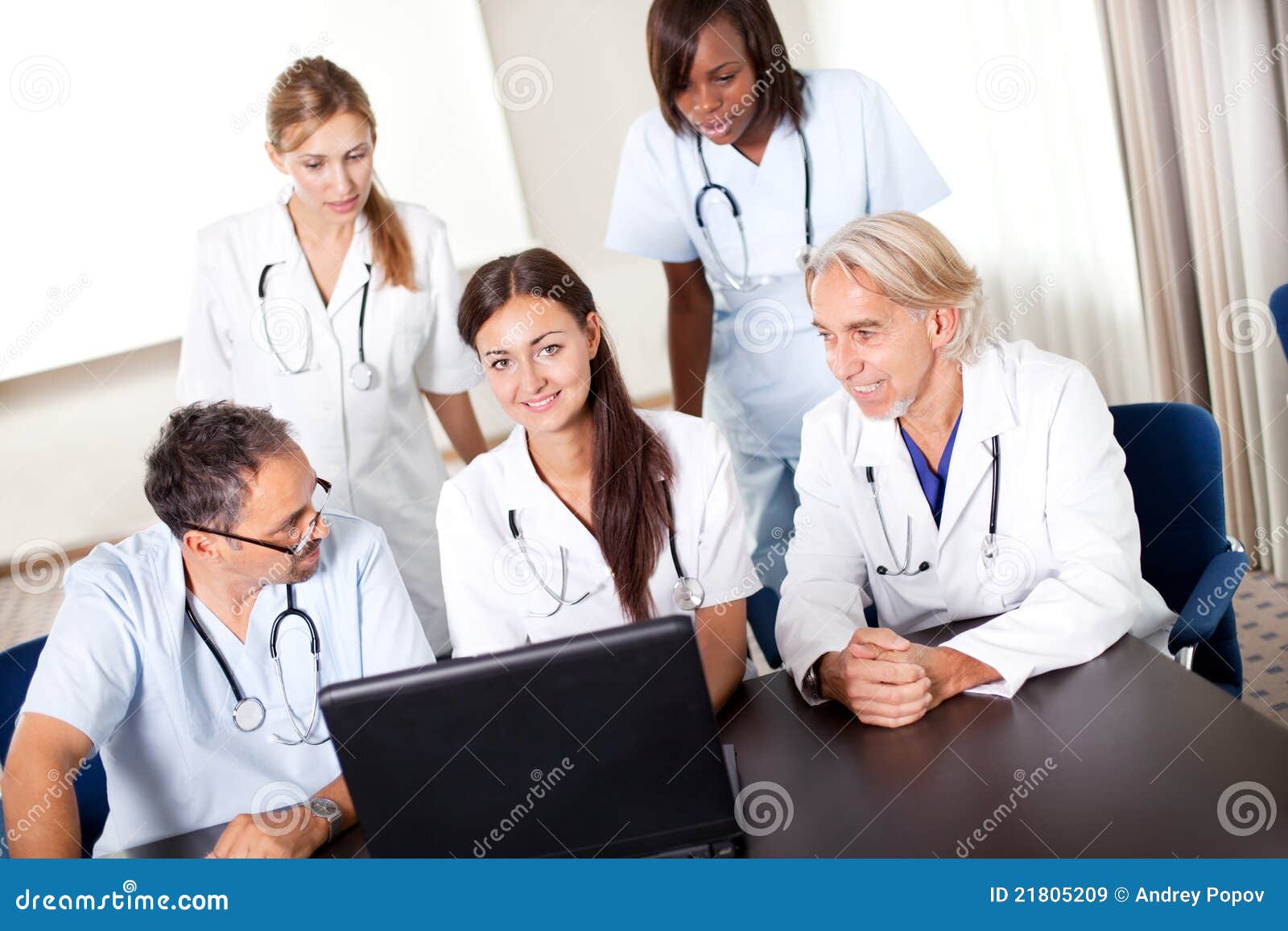 Portrait of Mature Young Doctors Working Together Stock Image - Image ...