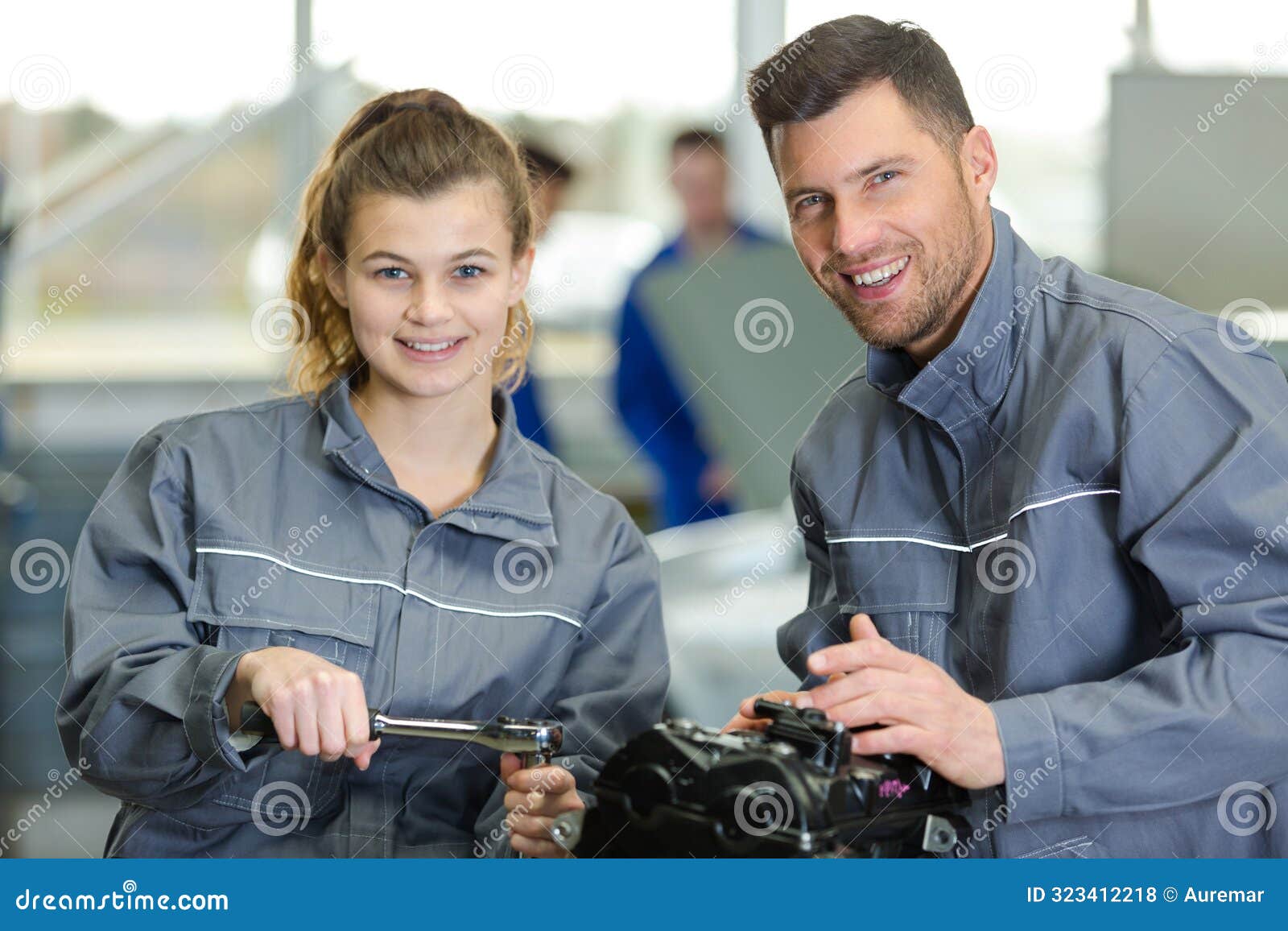 Portrait Of A Mechanic In Uniform And Flying Helmet, Repairing The ...