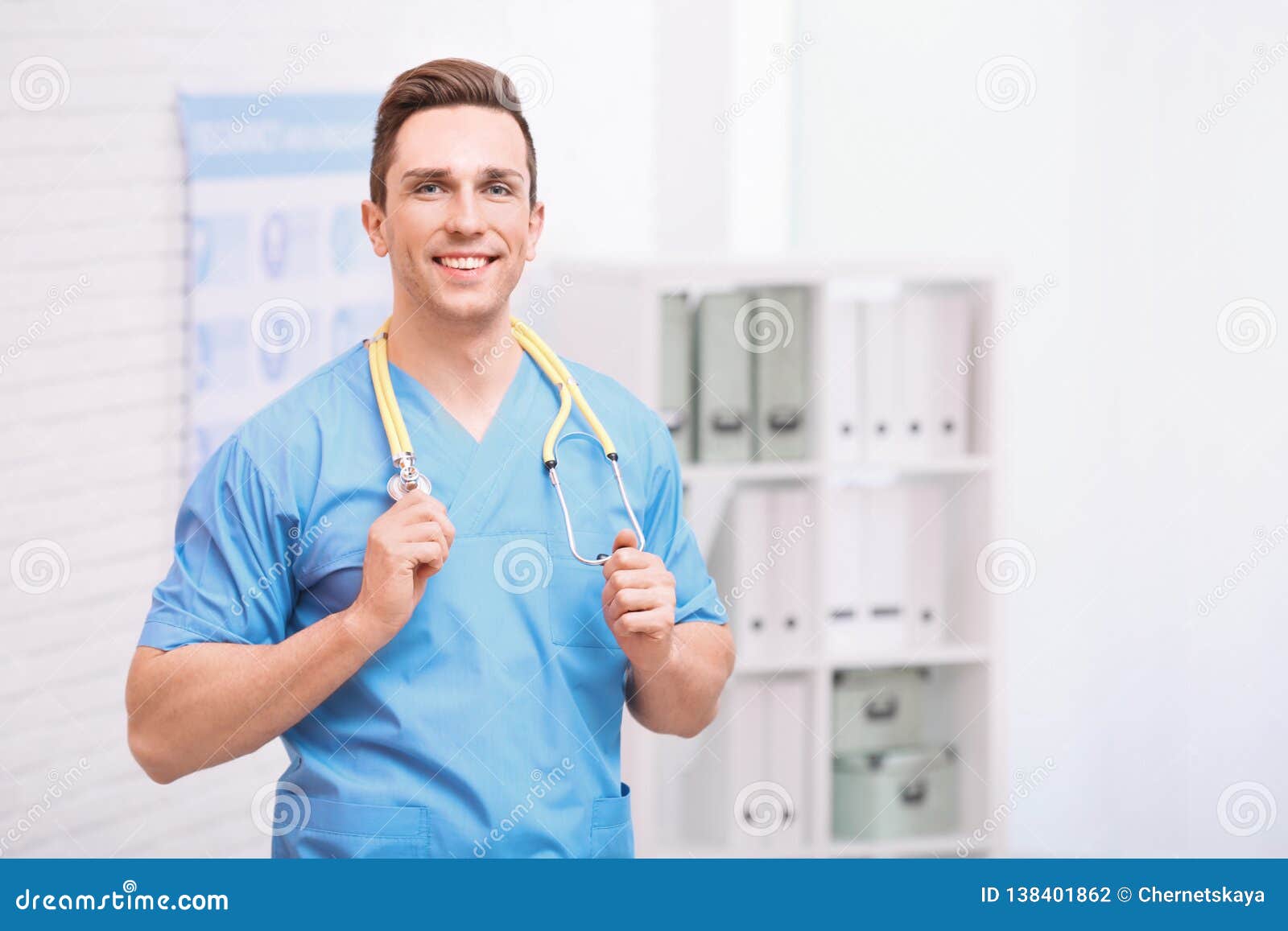 Portrait of Medical Assistant with Stethoscope in Hospital Stock Photo ...