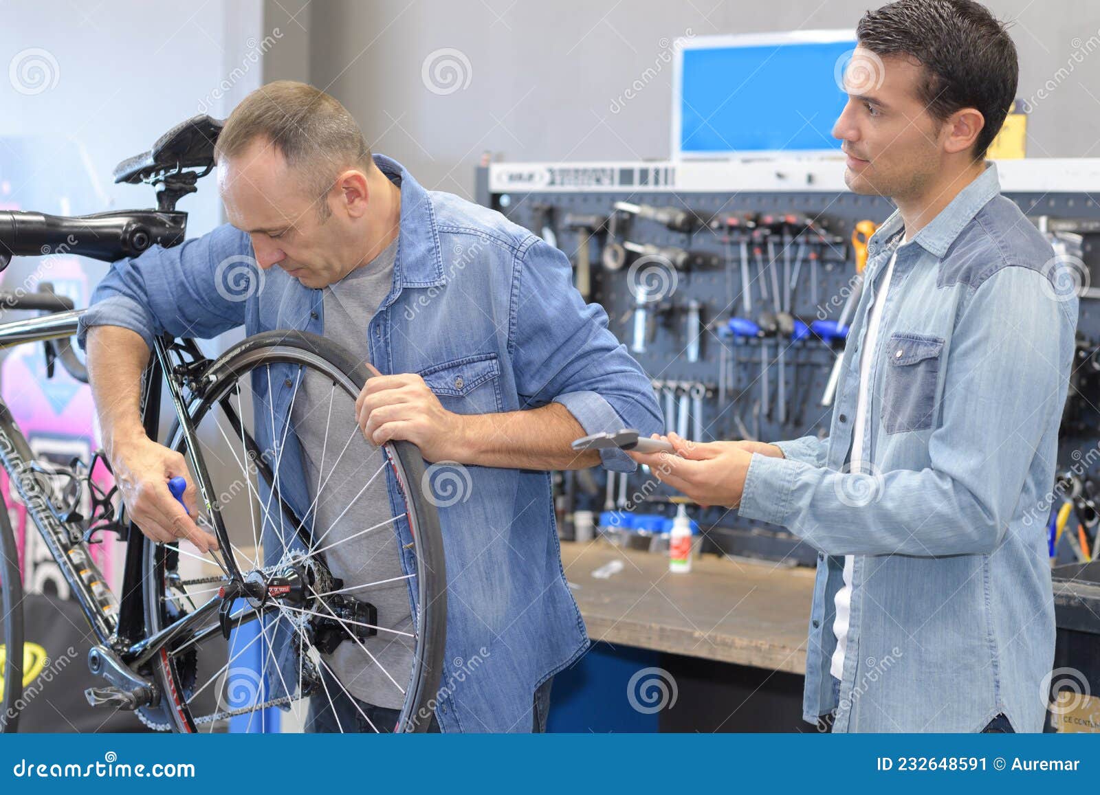 Portrait Men Assembling Bike Stock Image - Image of parked, custom ...