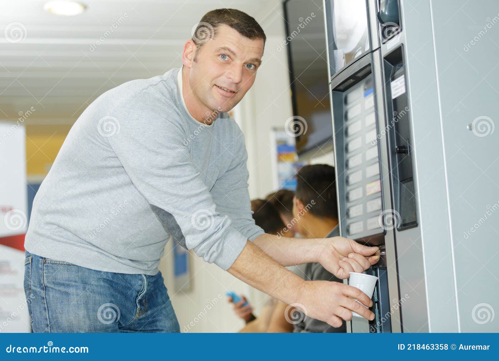 Portrait Man Getting Drink from Vending Machine Stock Photo - Image of ...