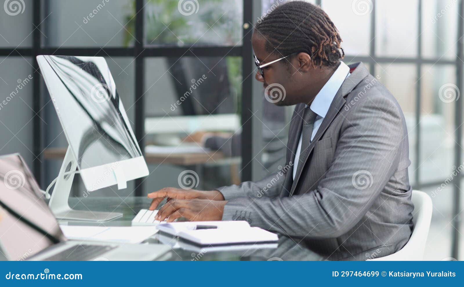 Portrait of a Man at His Workplace at the Table in Front of the ...
