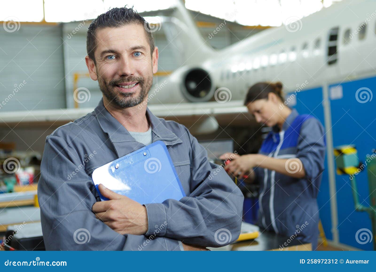 Portrait Of Aviation Copilot Using Control Panel Command In Cockpit ...