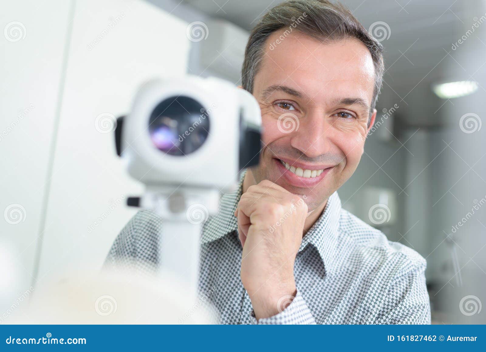 Portrait Middle-aged Man Behind Optical Device Stock Photo - Image of ...