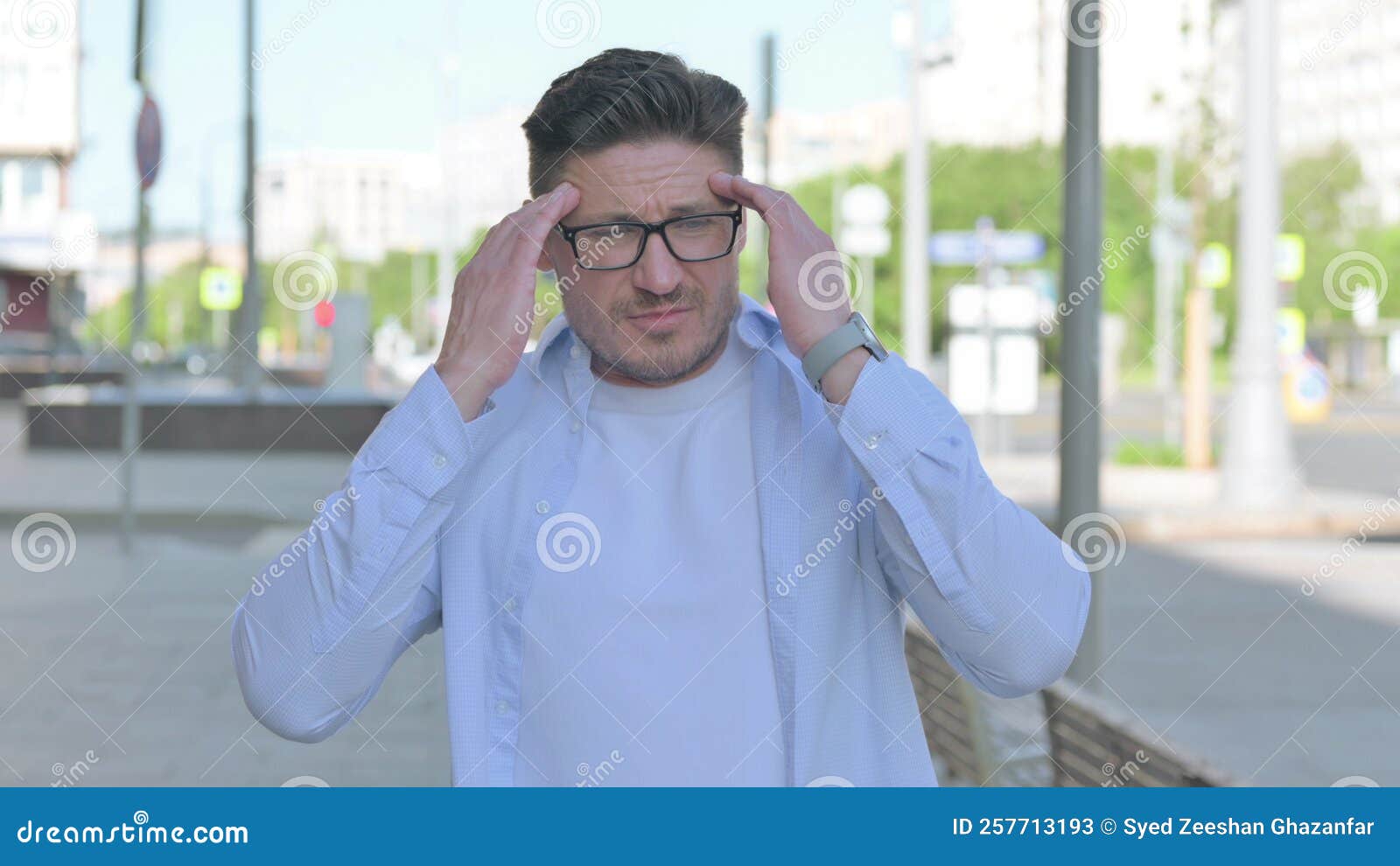Portrait of Man Having Headache Outdoor Stock Image - Image of males ...