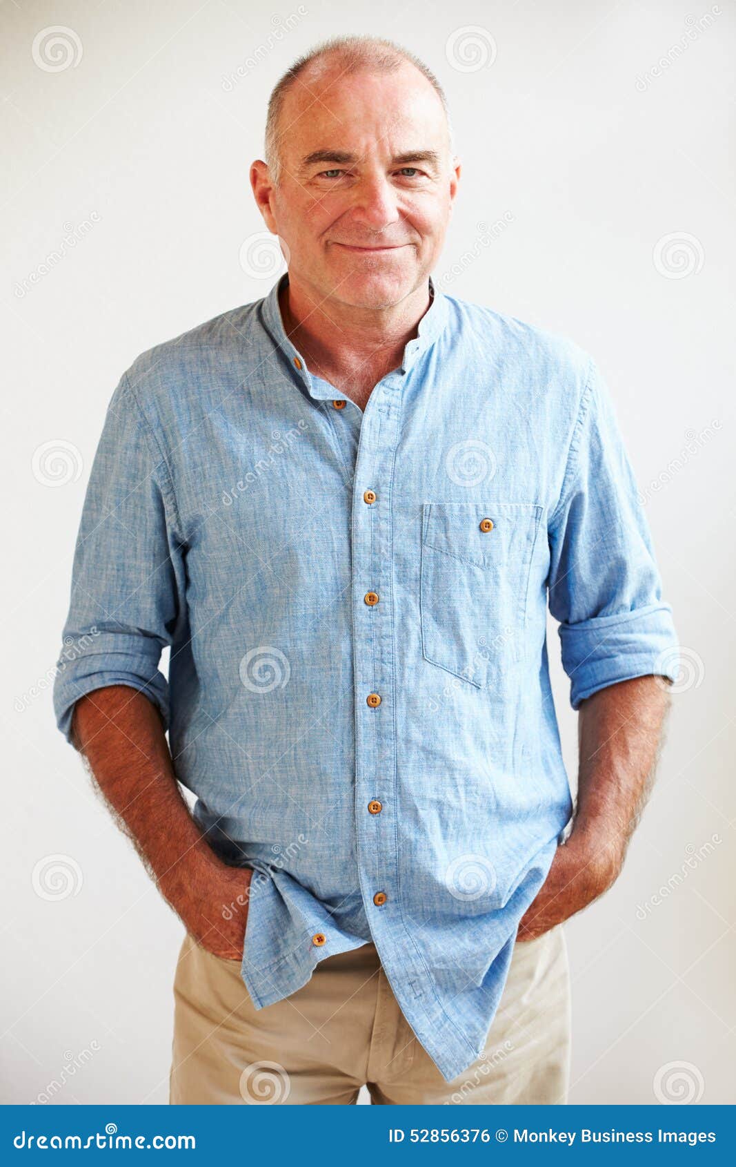 Portrait of Middle Aged Man Standing by Wall Stock Photo - Image of ...