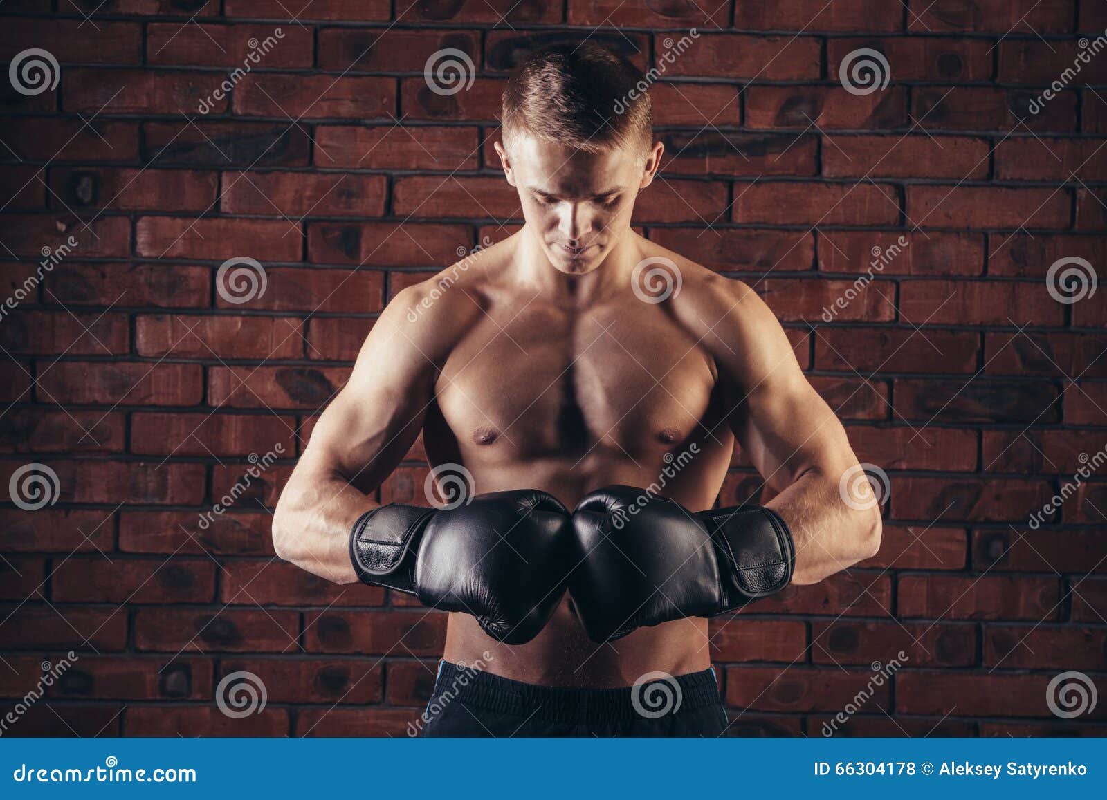 Portrait of Mma Fighter in Boxing Pose Against Brick Wall Stock Photo ...