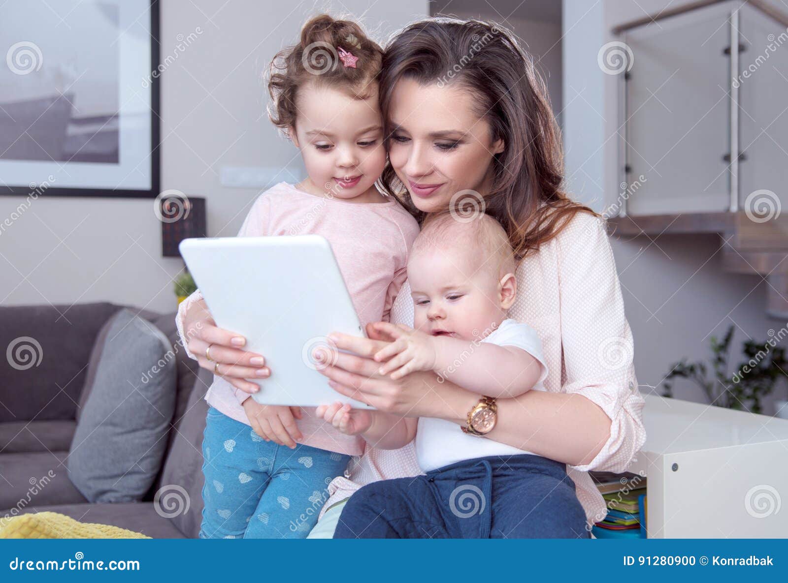 Portrait of a Mom with Children Using a Tablet Stock Photo - Image of ...