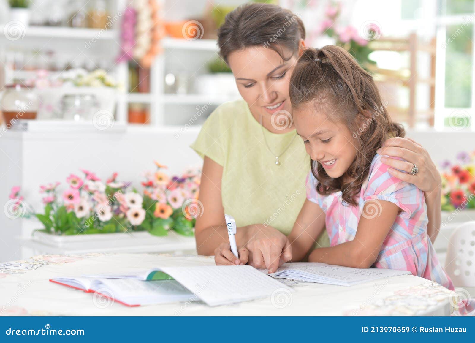 Portrait of Mother and Daughter Doing Homework Stock Image - Image of ...