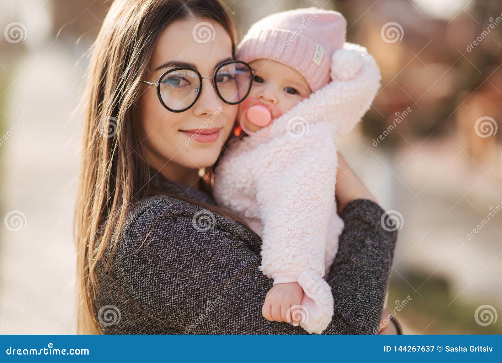 Portrait of Mother and Her Little Baby Girl. Beautiful Mom and Cute ... Portrait of Mother and Her Little Baby Girl. Beautiful Mom and Cute ...