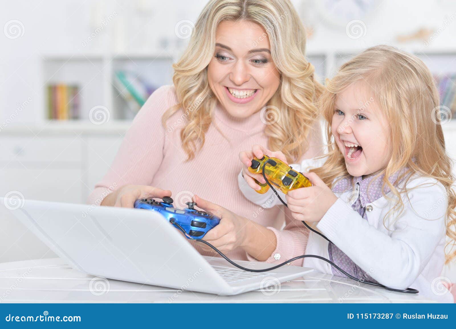 Mother with Little Daughter Playing Computer Games Stock Image - Image ... Mother with Little Daughter Playing Computer Games Stock Image - Image ...