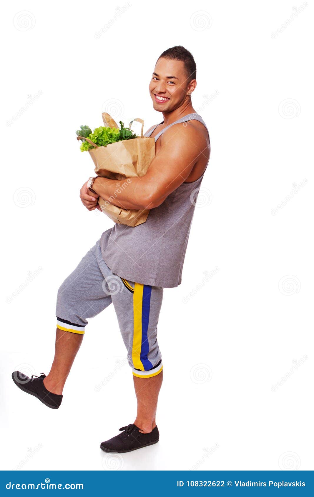 Portrait of Muscle Man Posing in Studio with Food Stock Photo - Image ...