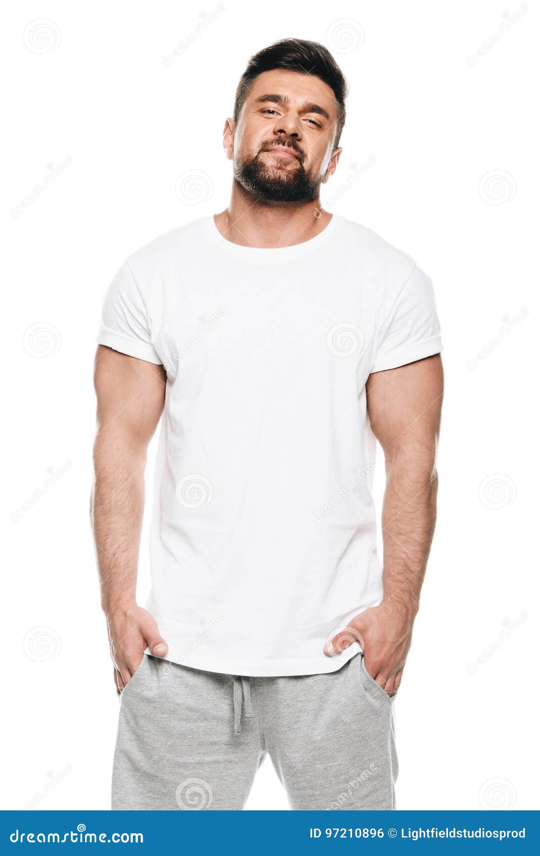 Portrait of Muscular Bearded Man Standing with Hands in Pockets and ...