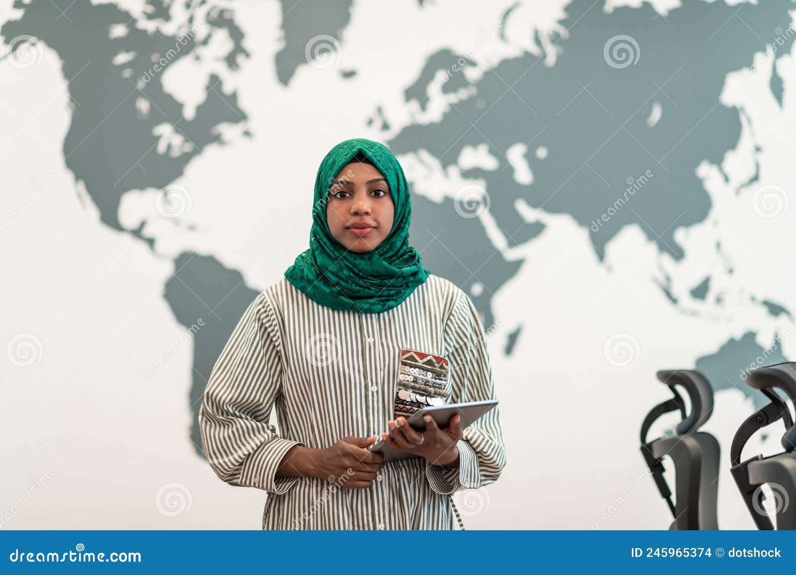 Portrait of Muslim Female Software Developer with Green Hijab Holding ...