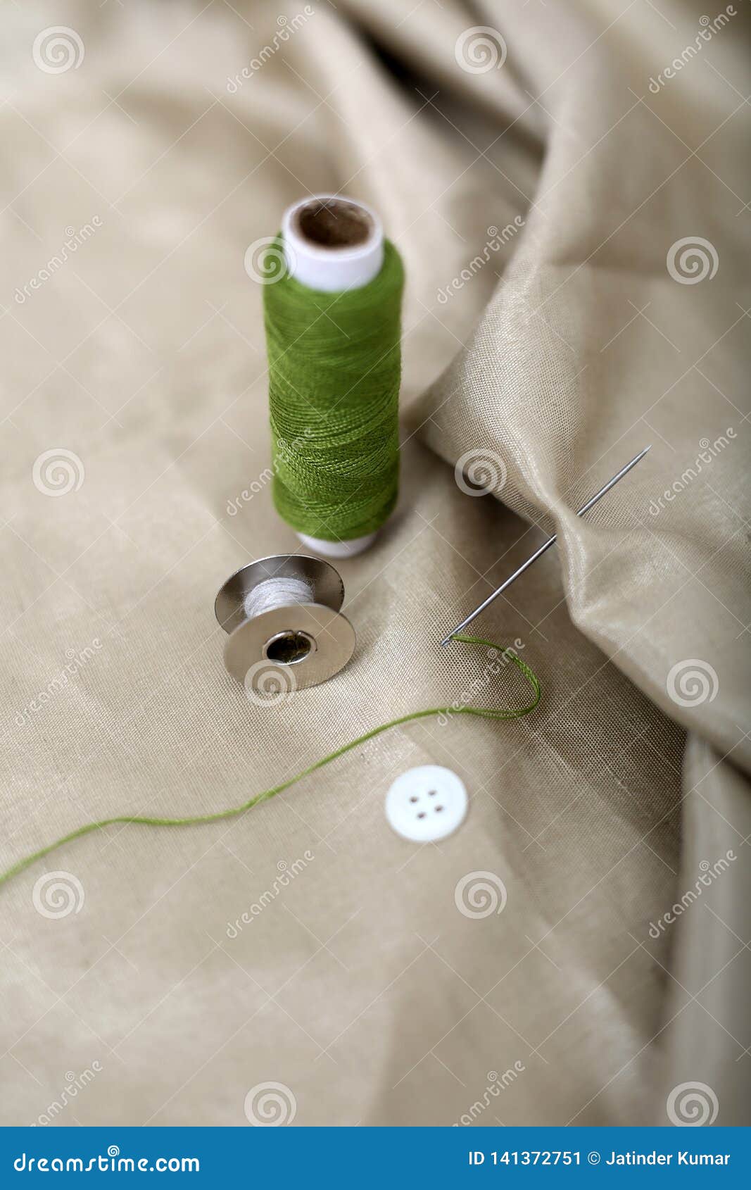 Portrait of Needle Attached in Cloth with Green Sewing Thread and ...