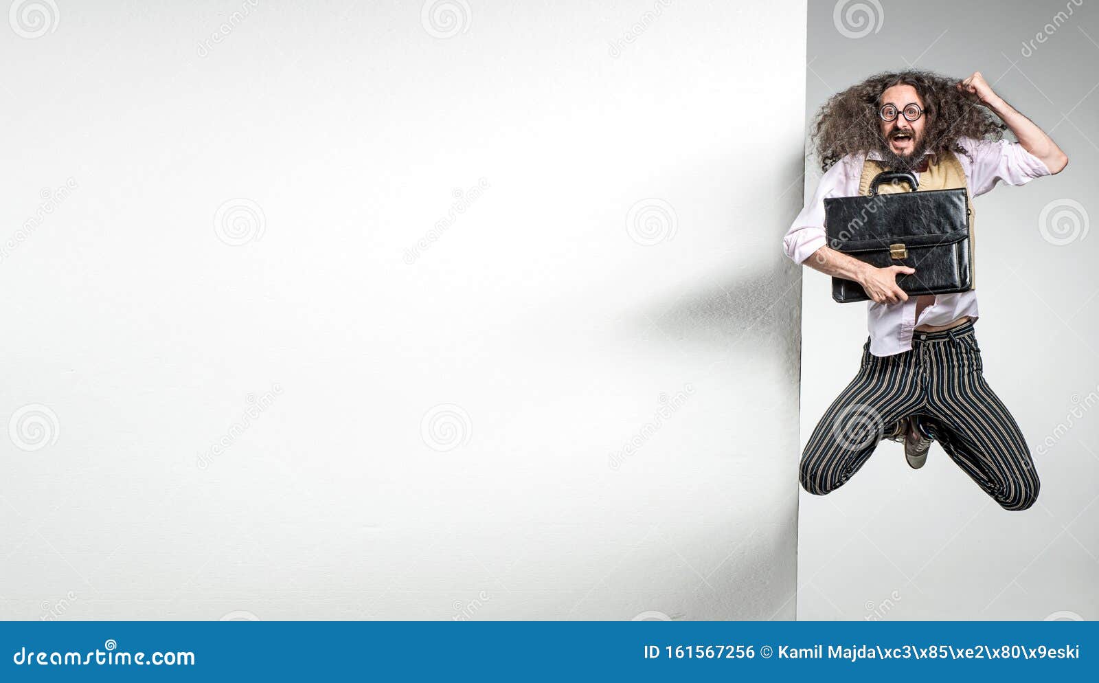 Portrait of a Nerd Jumping Next To the White, Empty Board Stock Photo ...