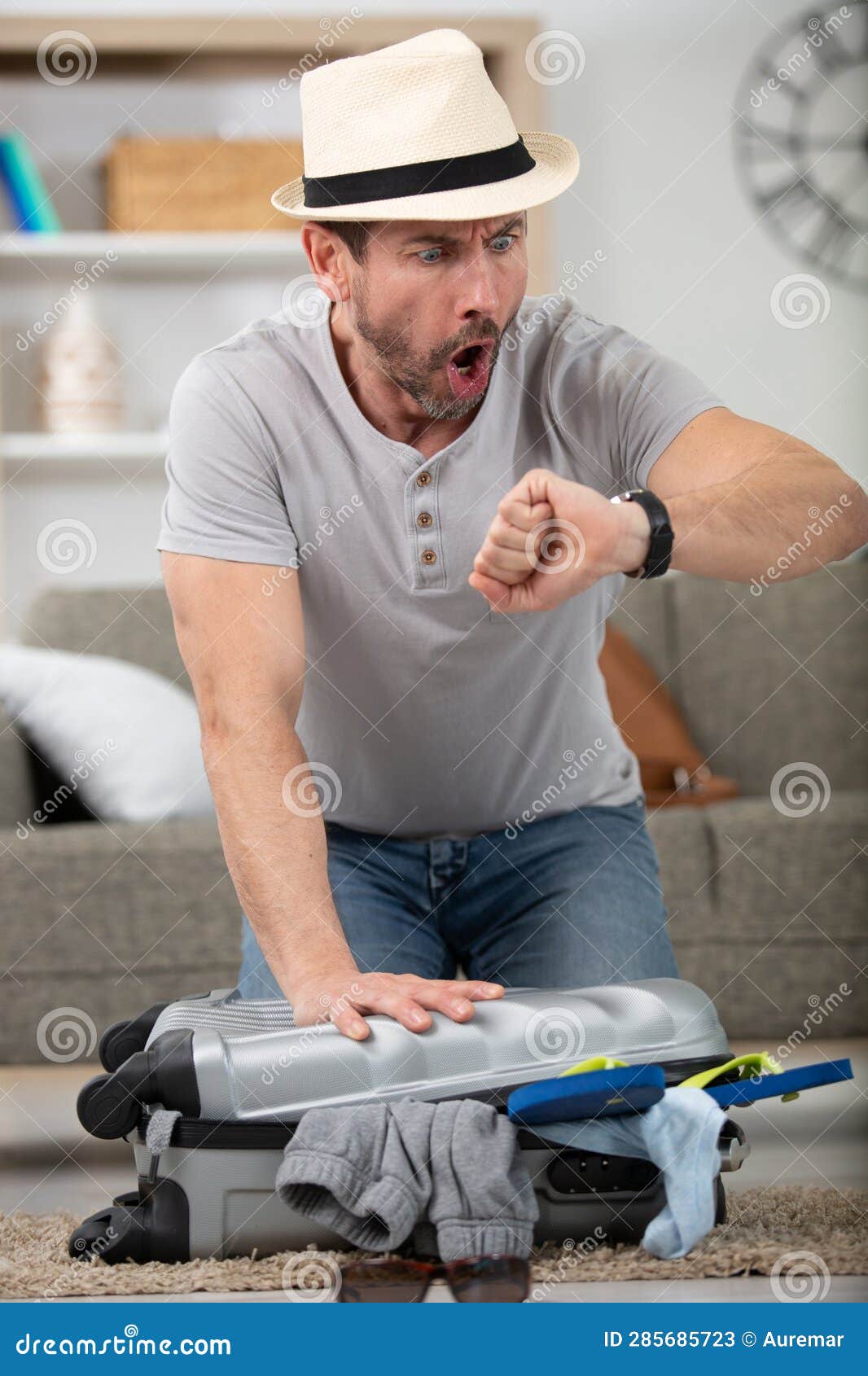 Portrait Nervous Man Packing Suitcase Looking on Clock Stock Image ...