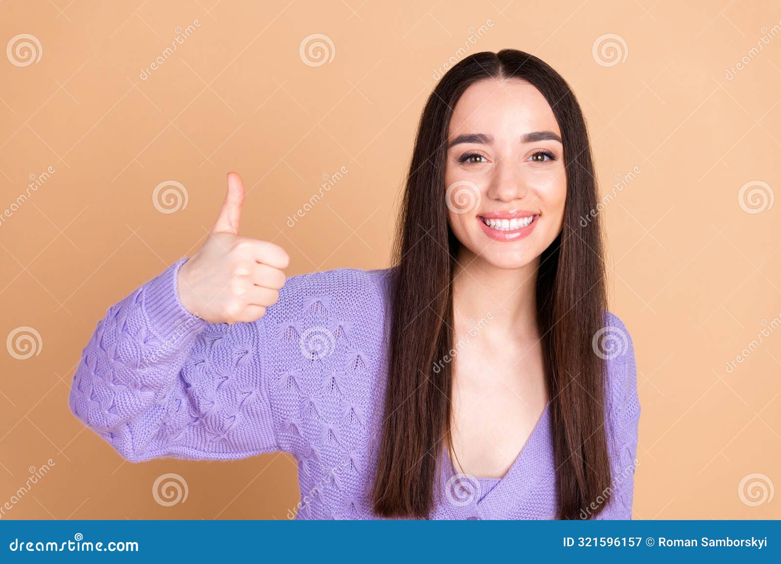 Portrait Of Nice Young Woman Show Thumb Up Wear Cardigan Isolated On