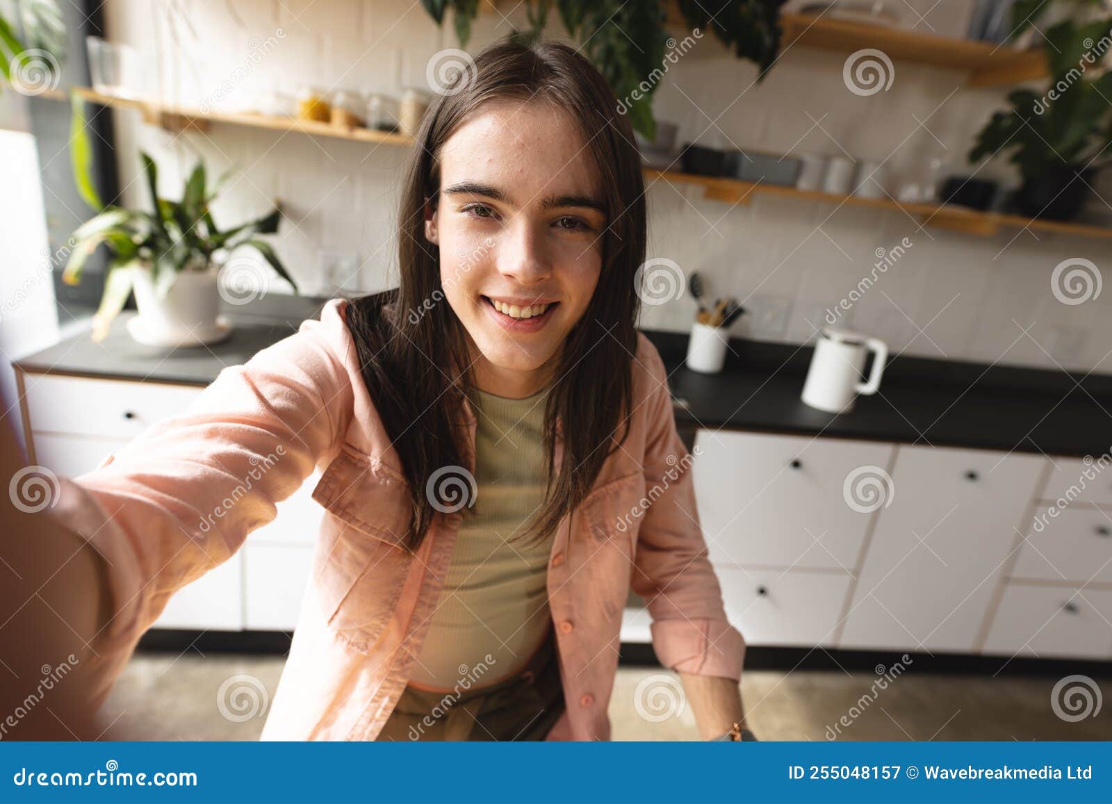 Portrait of Non-binary Trans Woman Smiling Looking at the Camera in the ...