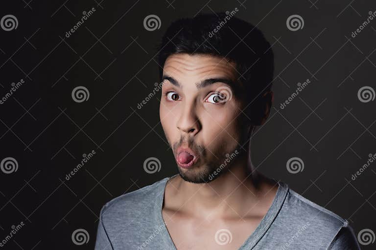 Portrait of a Normal Boy Fun Over Grey Background Stock Photo - Image ...