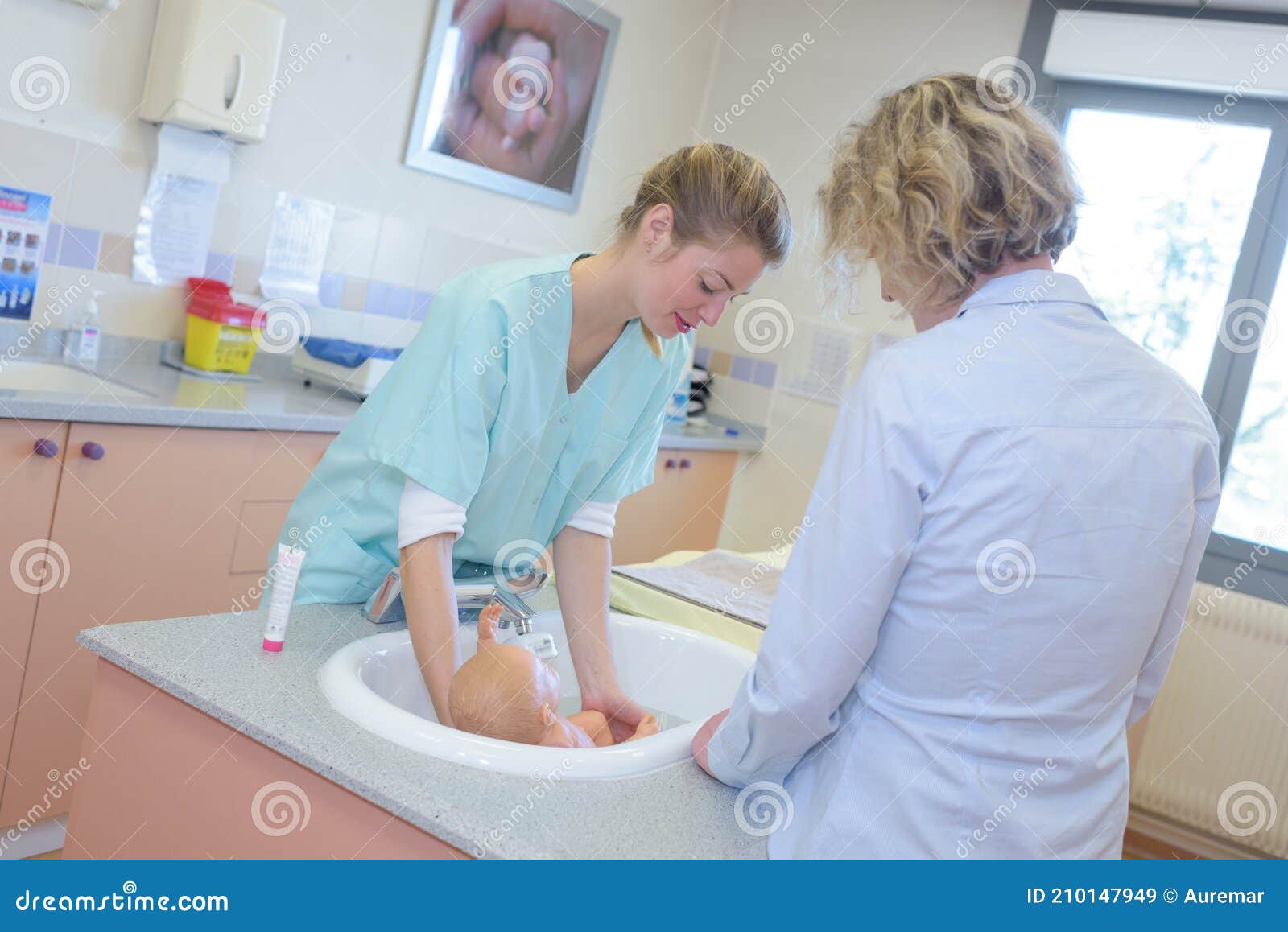 Portrait Nurse Bathing Newborn Stock Image - Image of guidance, female ...