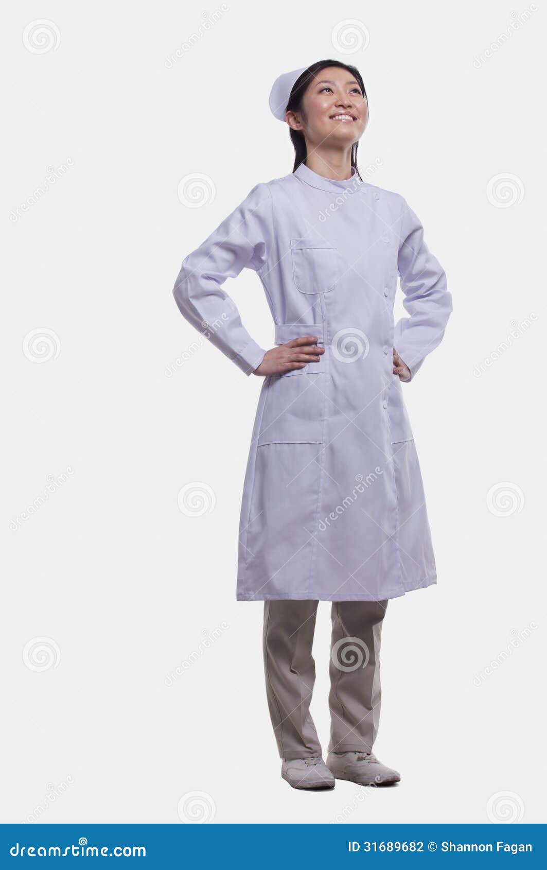 Portrait of Nurse with Hands on Hips, Studio Shot Stock Photo - Image ...