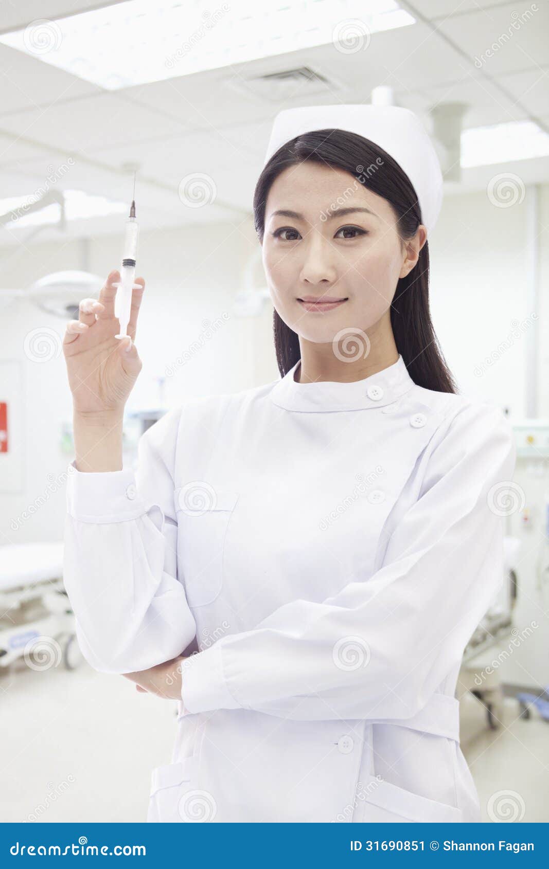 Portrait of Nurse Holding a Syringe Stock Image - Image of looking ...