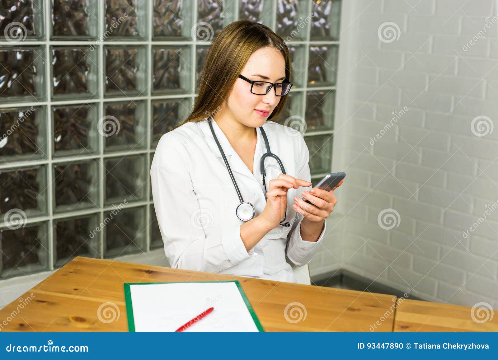 Portrait of Nurse in Office Using Smartphone Stock Photo - Image of ...