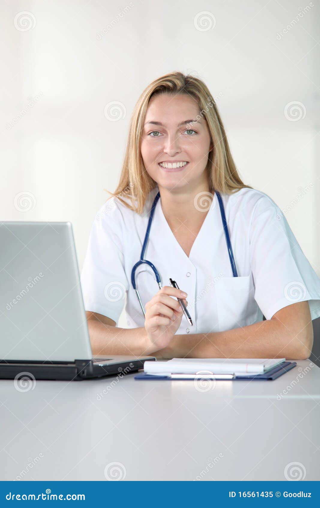 Portrait of nurse at work stock image. Image of smiling - 16561435