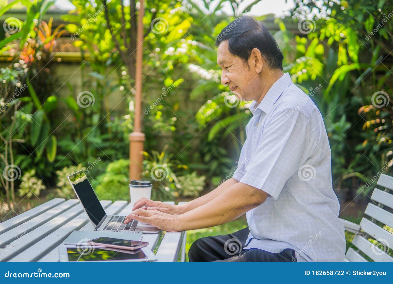 Portrait of Old Man Sitting on Couch and Using Laptop Stock Photo ...