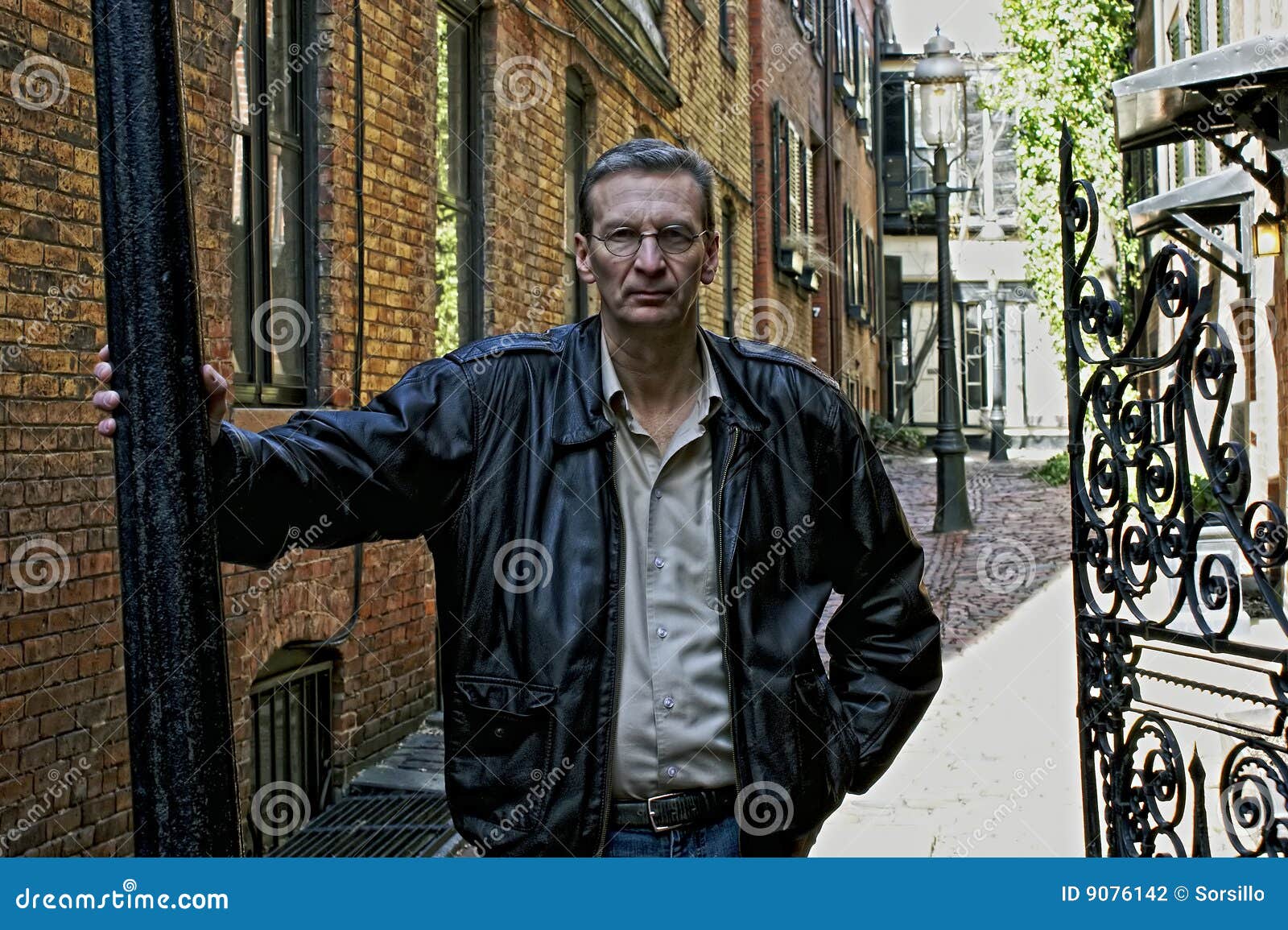 Portrait of Older Man Outside at Gate Stock Photo - Image of jacket ...