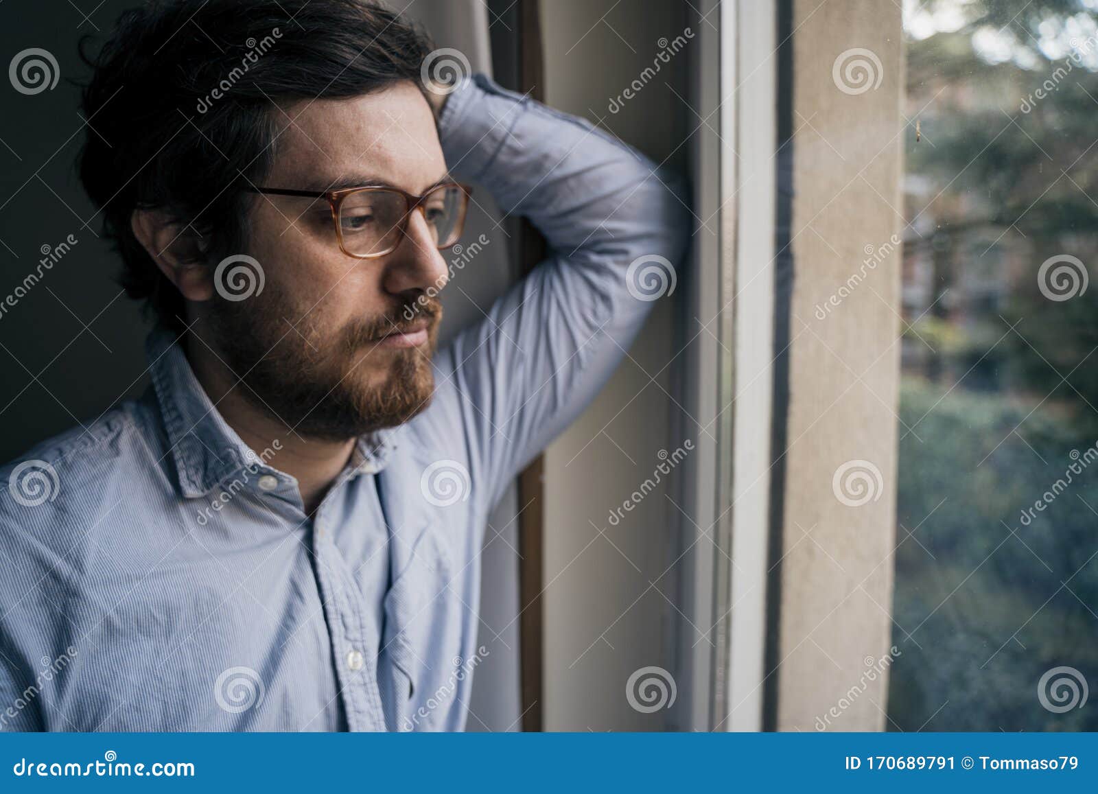Portrait of One Guy Longing and Looking through Window Stock Image ...