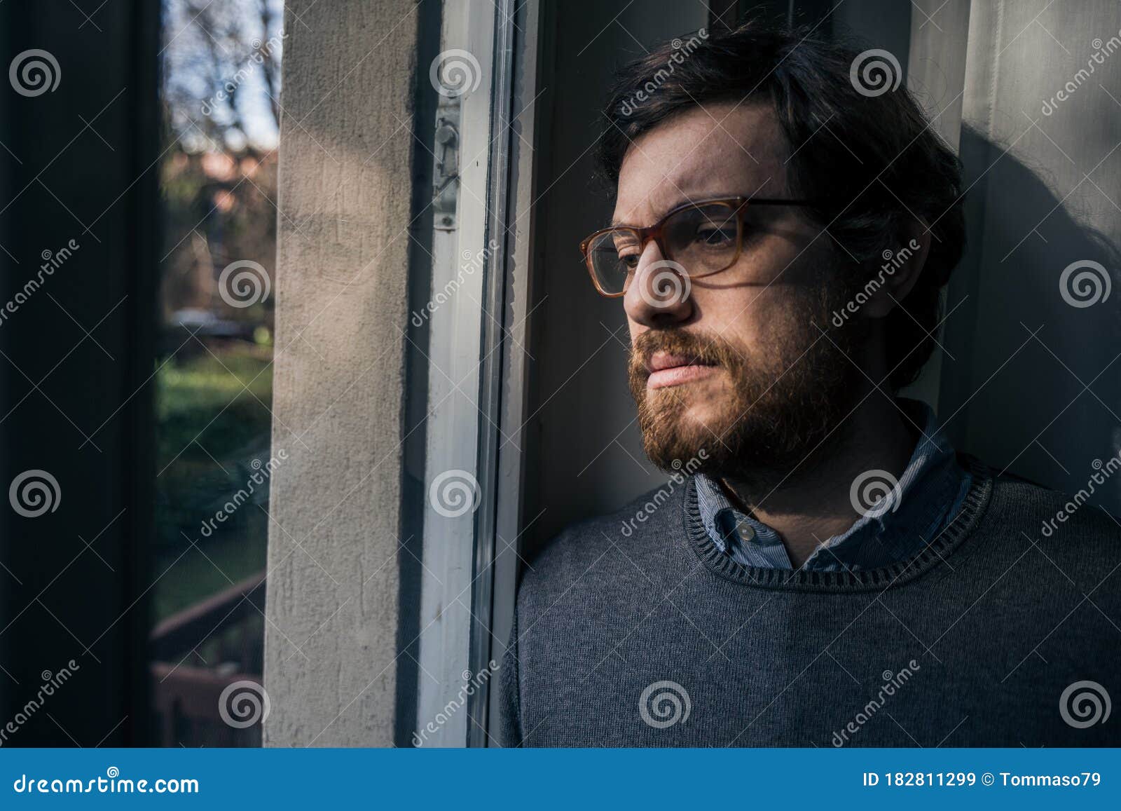 Portrait of One Guy Longing and Looking through Window Stock Image ...