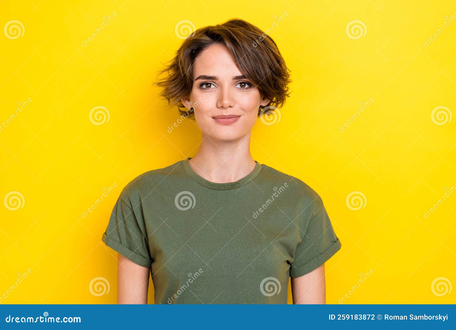 Portrait Of Optimistic Cheerful Woman With Bob Hairdo Dressed Khaki T