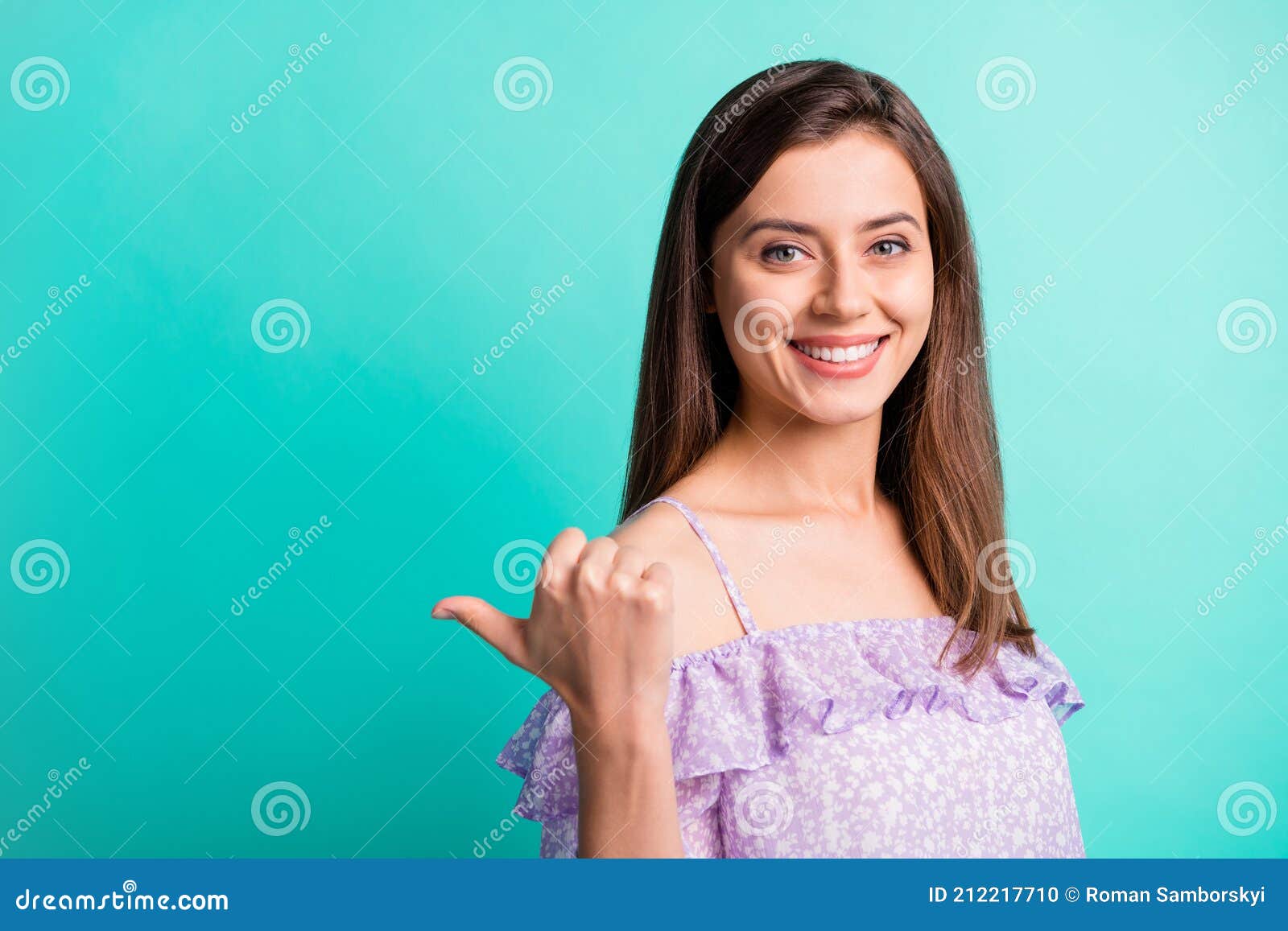 Portrait Of Optimistic Funky Brunette Girl Pointing Back Empty Space