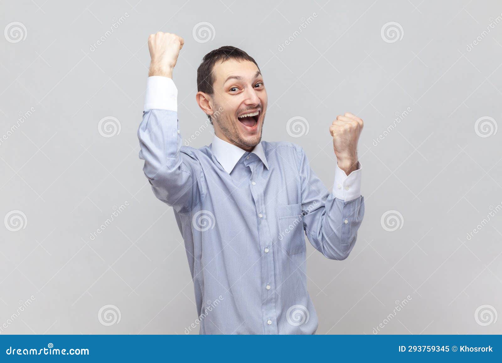 Overjoyed Happy Man with Raised Clenched Fists, Screaming with ... Overjoyed Happy Man with Raised Clenched Fists, Screaming with ...