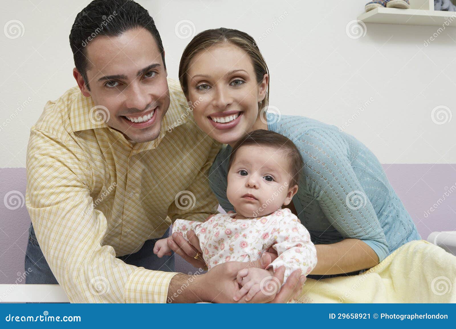 Portrait of Parents with Baby at Home Stock Image - Image of childhood ...