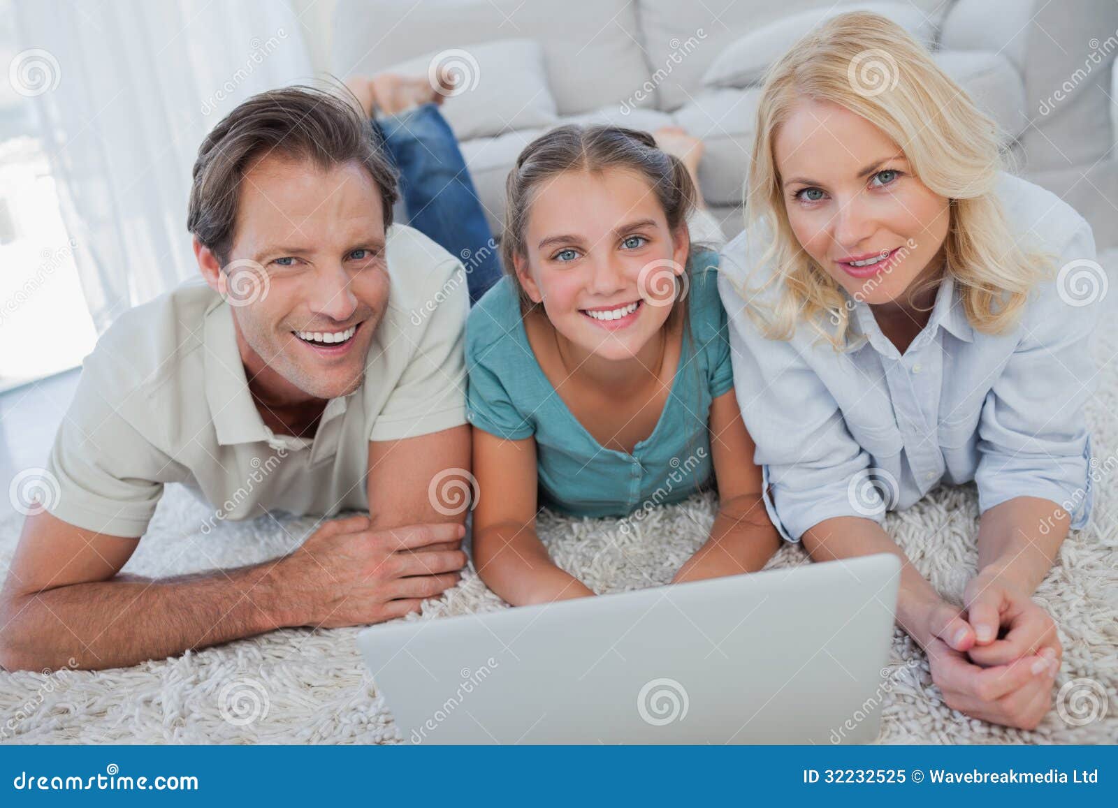 Portrait of Parents and Daughter Using a Laptop Stock Image - Image of ...