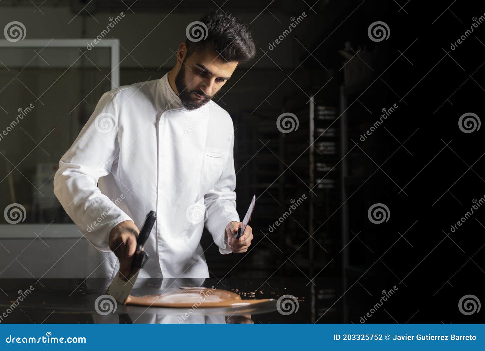 Pastry Chef Working on Tempering Chocolate on Marble Table Stock Photo ...