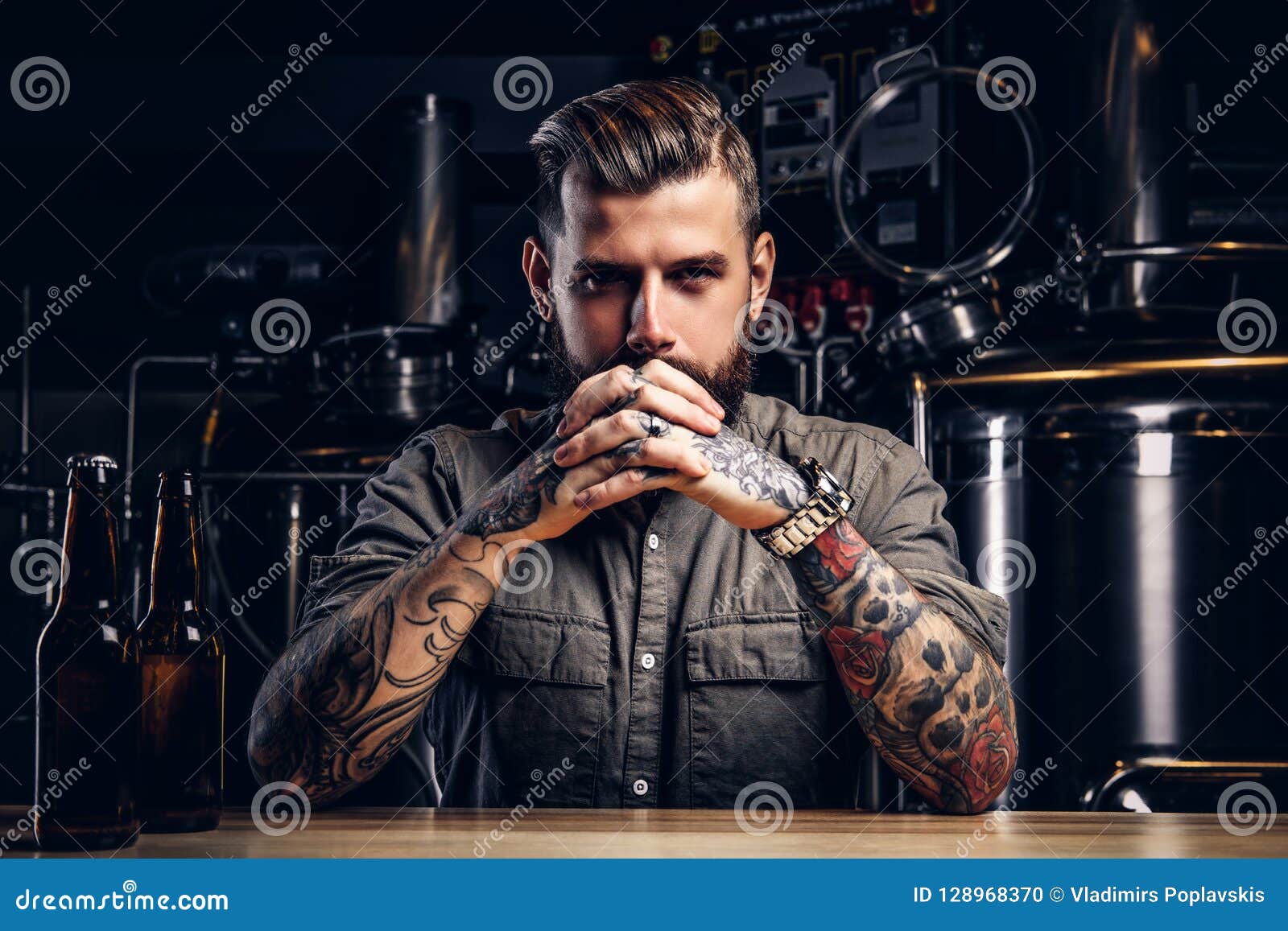 Portrait of a Pensive Tattooed Hipster Male with Stylish Beard and Hair ... Portrait of a Pensive Tattooed Hipster Male with Stylish Beard and Hair ...