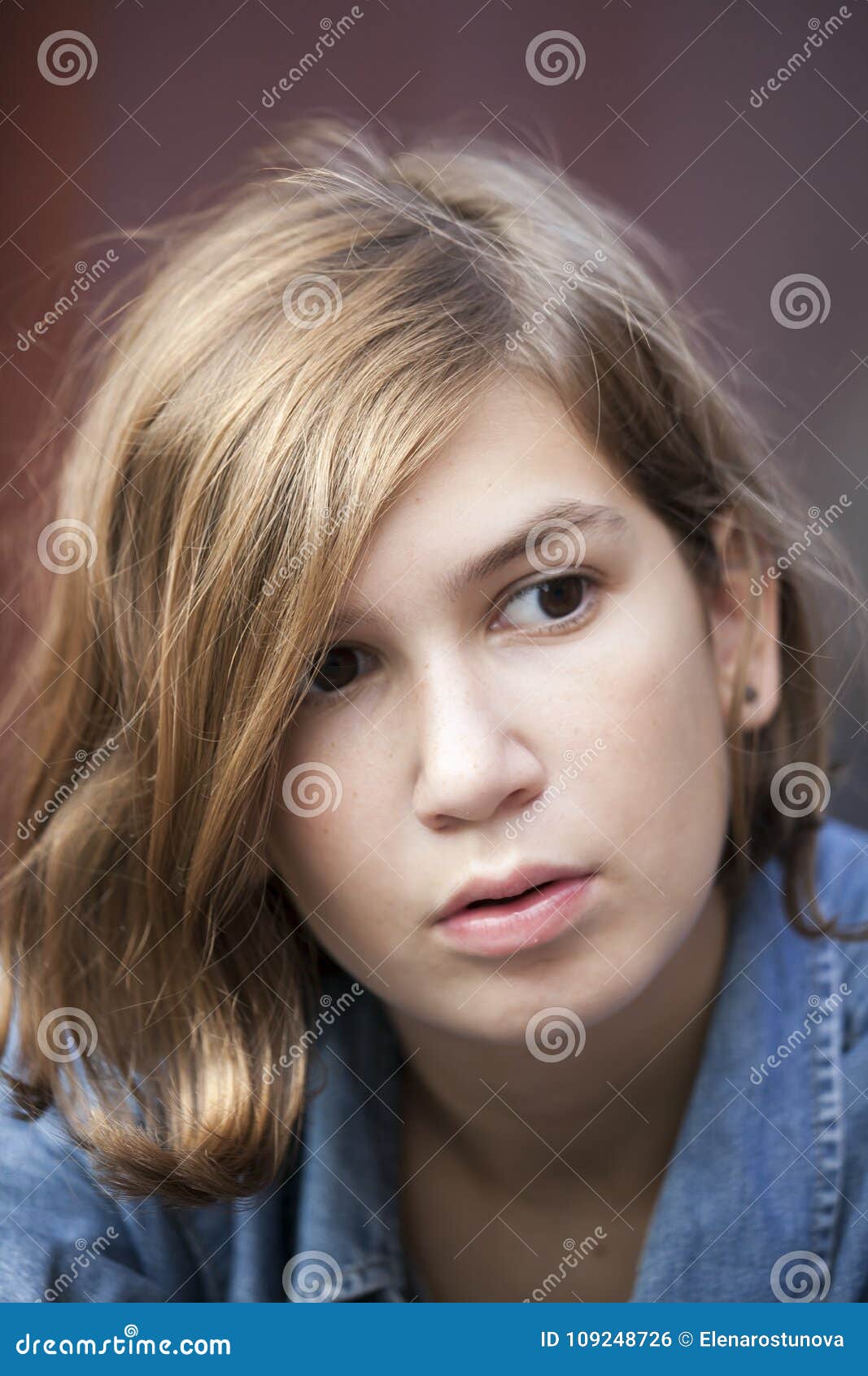 The Portrait of a Pensive Young Girl with a Hairstyle Stock Photo ... The Portrait of a Pensive Young Girl with a Hairstyle Stock Photo ...