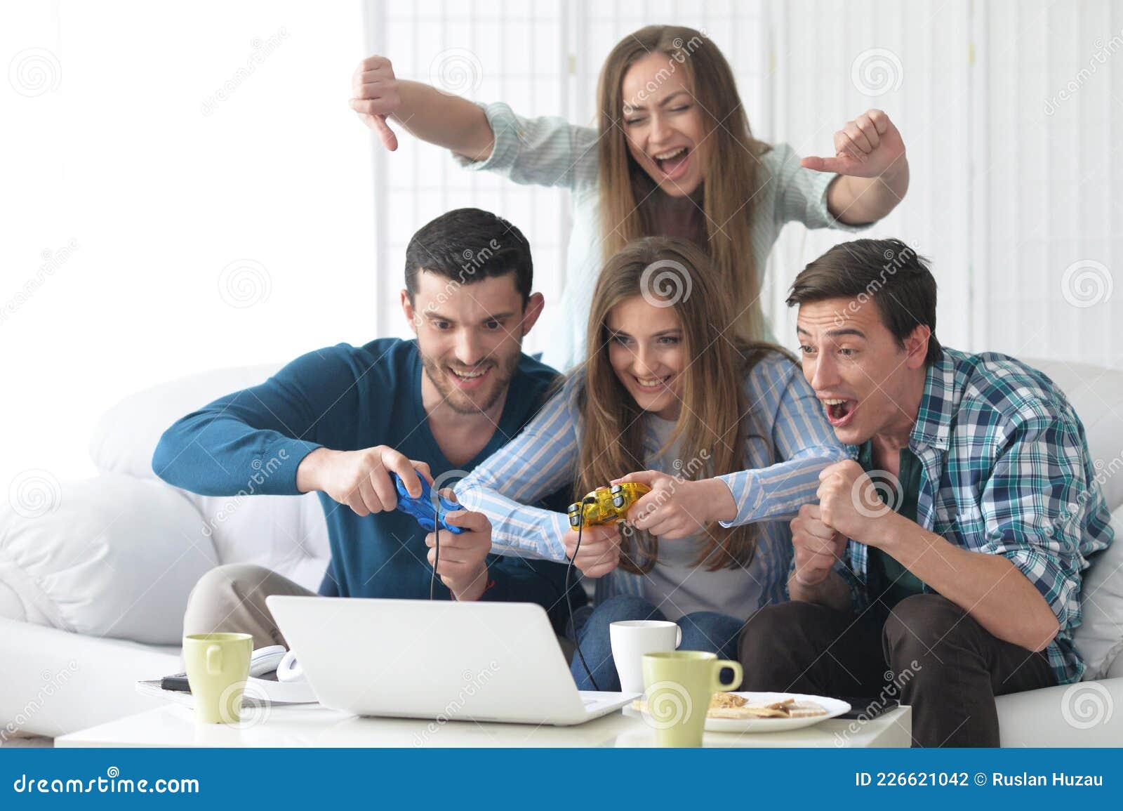 Portrait of People Playing Computer Game with Laptop Stock Photo ...