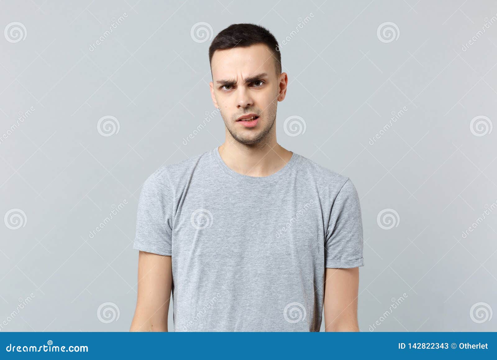 Portrait of Perplexed Concerned Young Man in Casual Clothes Standing ...